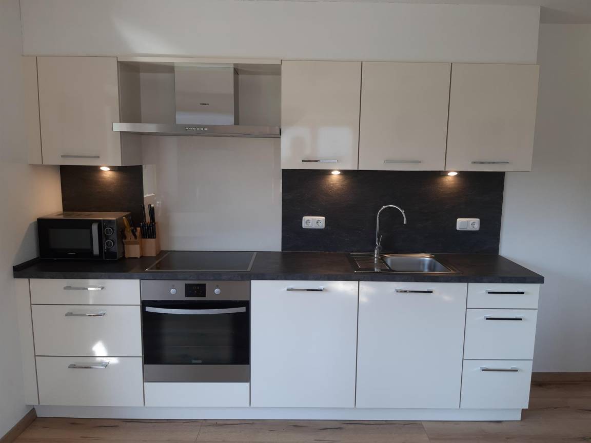 65 M² Ferienwohnung ∙ 1 Schlafzimmer ∙ 2 Gäste - Kössen