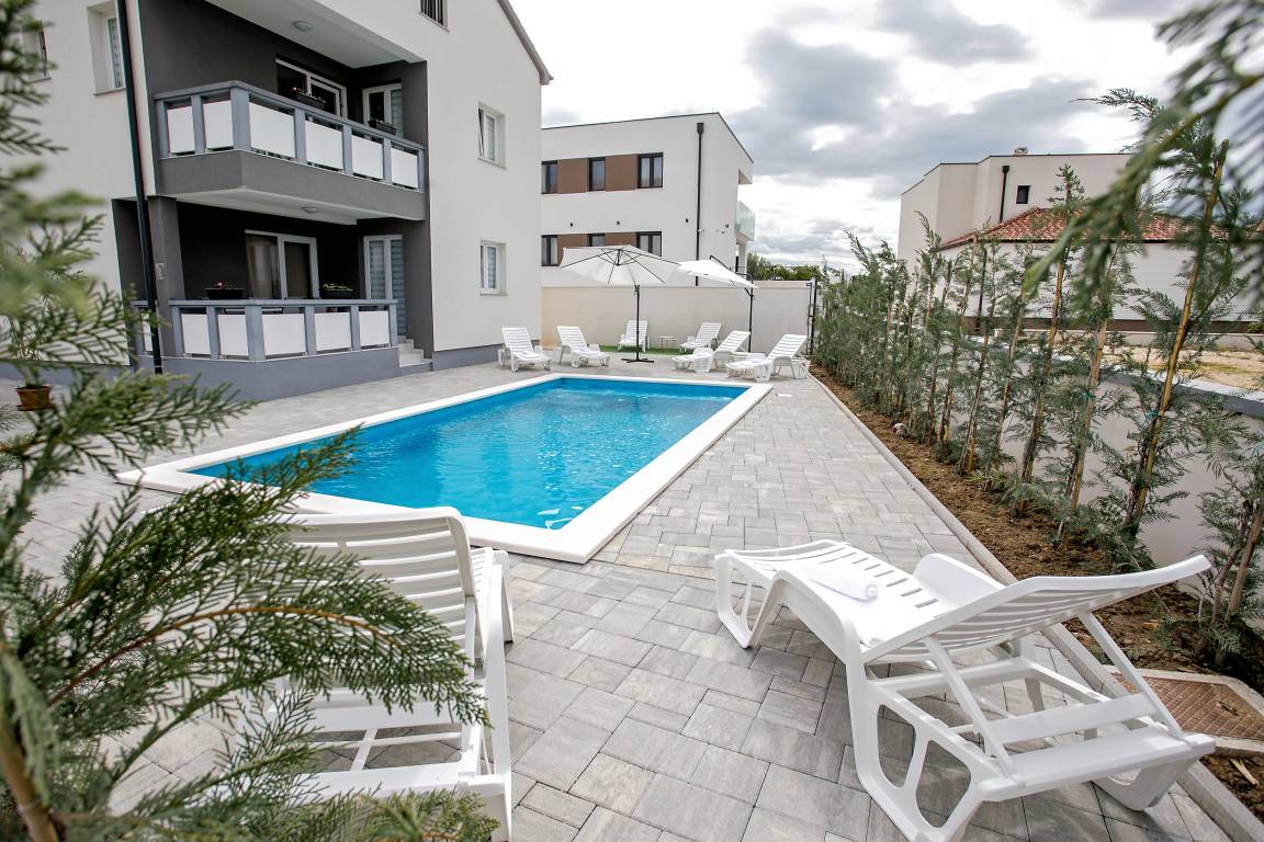 30 M² Ferienwohnung ∙ 1 Schlafzimmer ∙ 4 Gäste - Nin